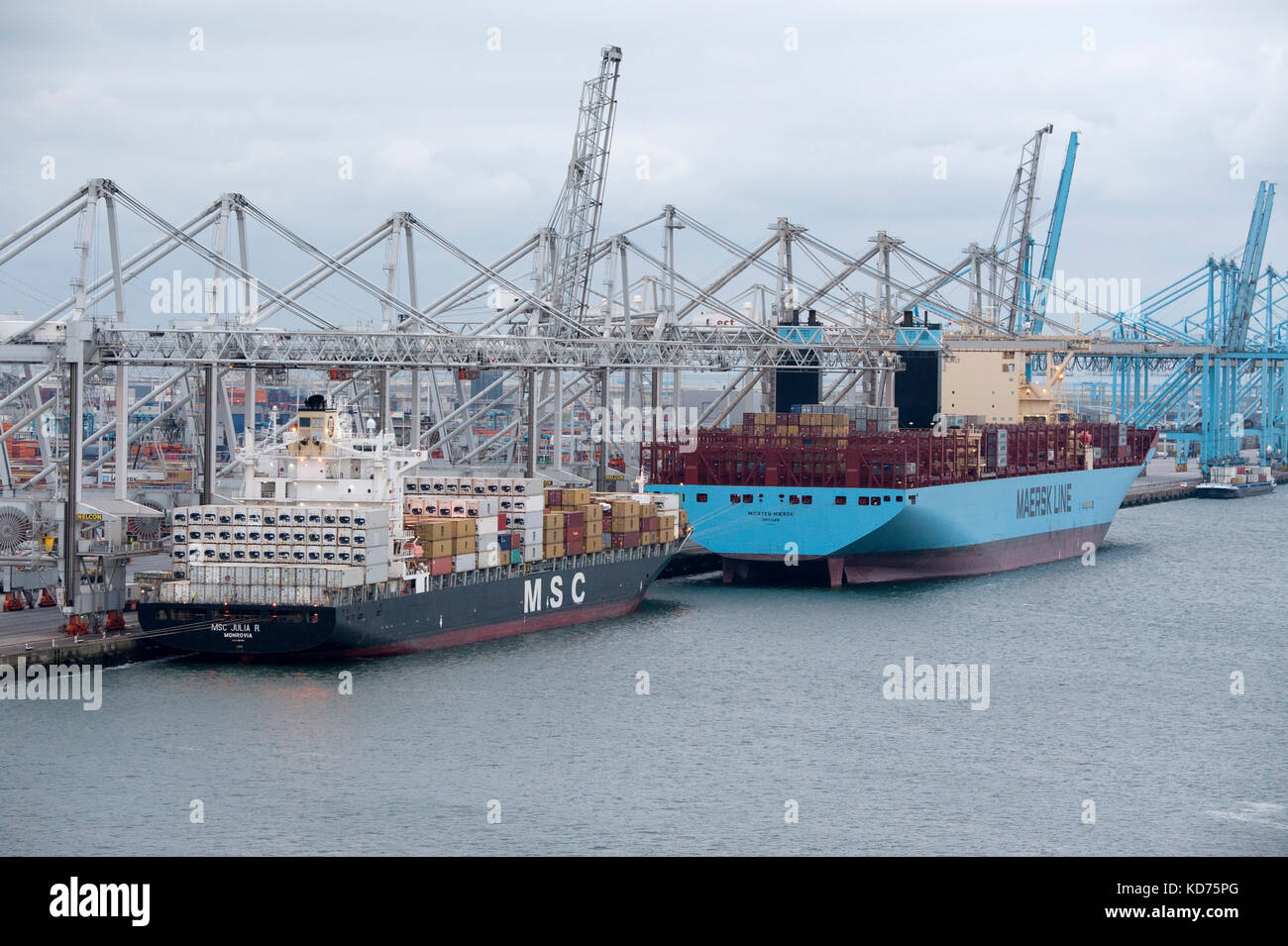 Rotterdam container port with container ships, cargo ships and cranes ...