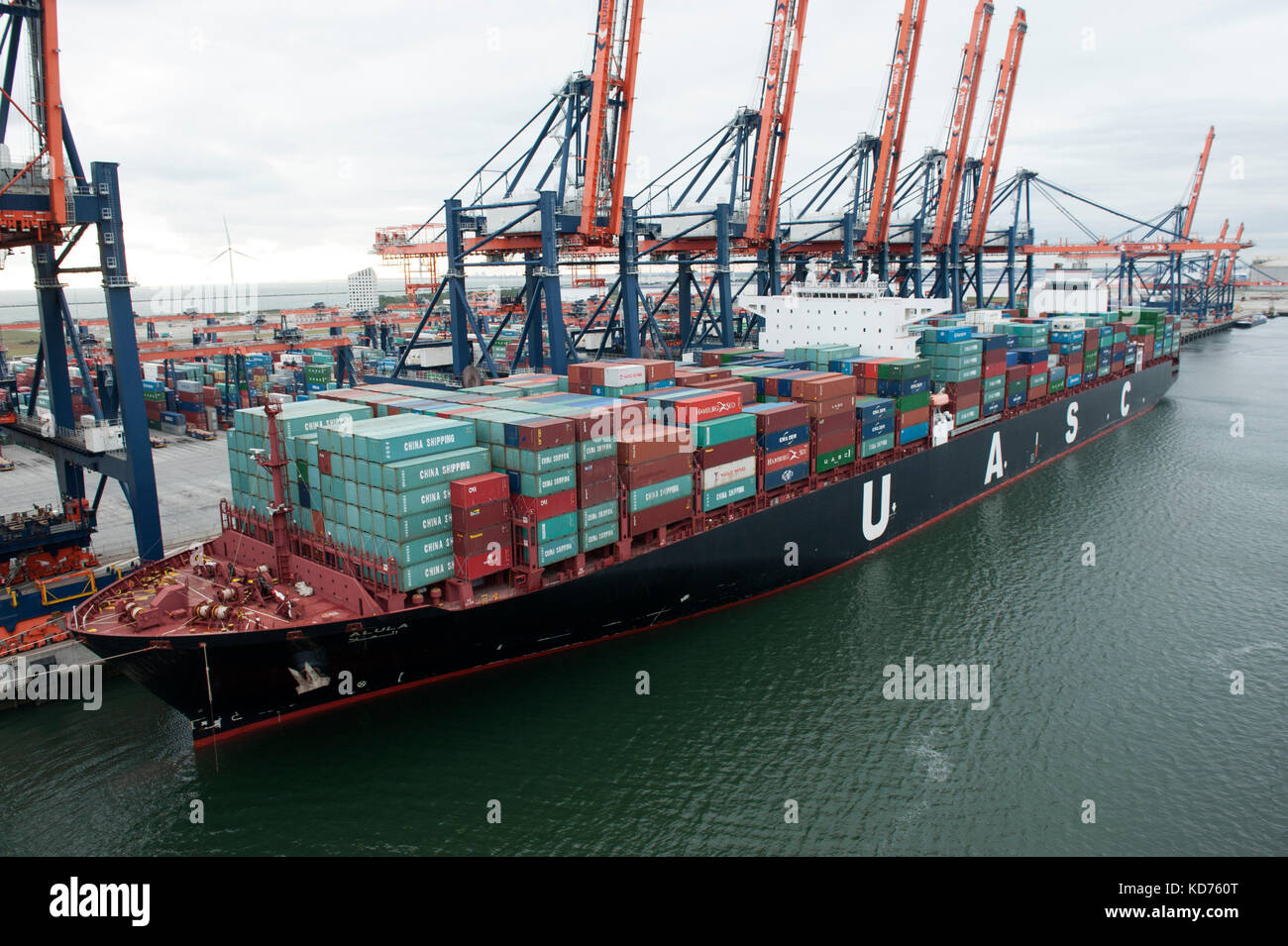 Rotterdam container port with container ships, cargo ships and cranes ...