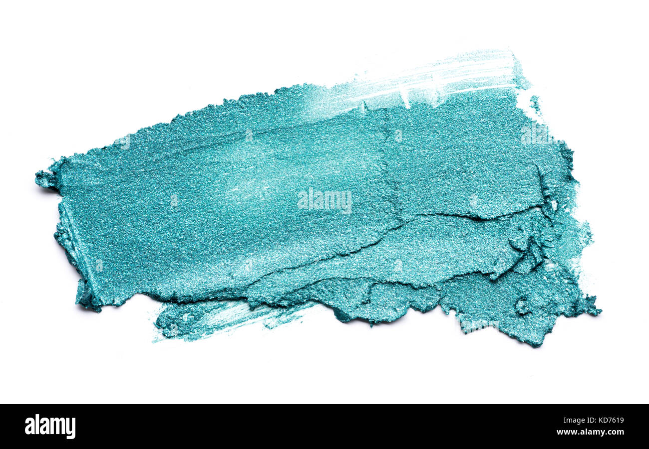 Green smear of cosmetic products on a white background Stock Photo - Alamy