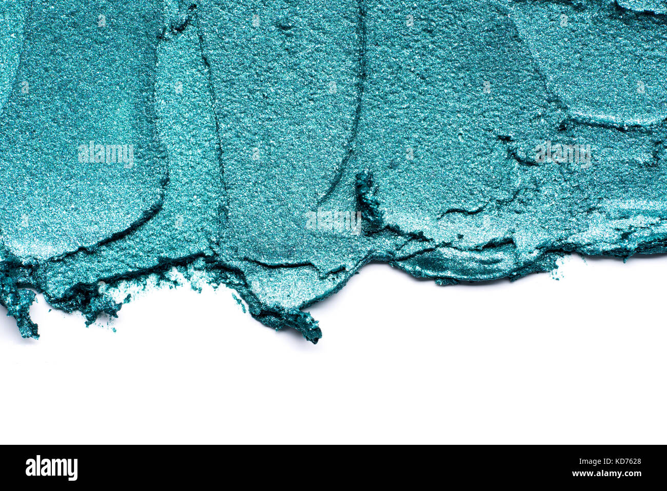 Green smear of cosmetic products on a white background Stock Photo - Alamy