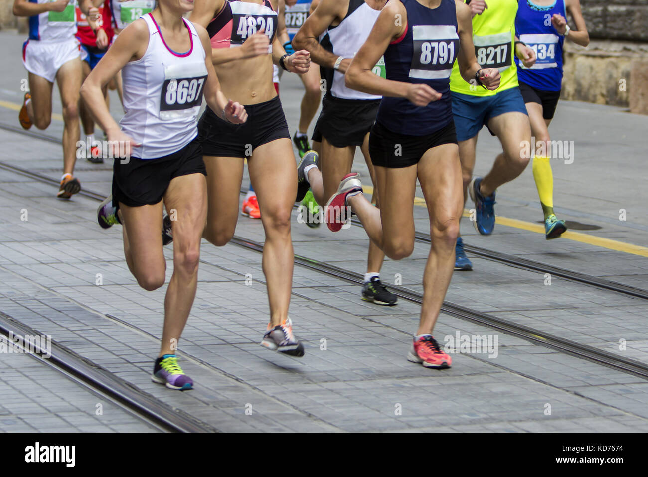 Marathon running race on the city road Stock Photo - Alamy