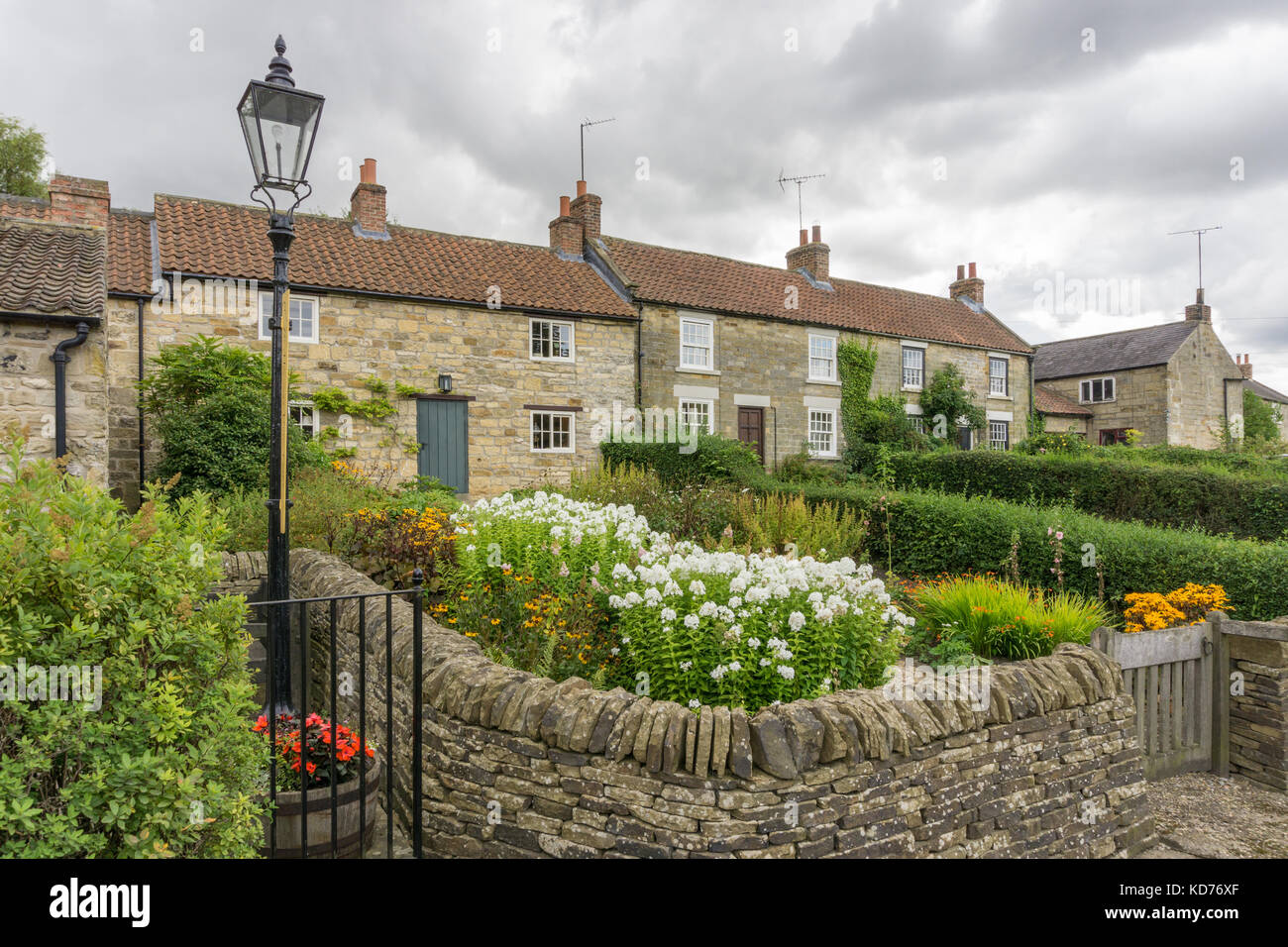 Row of terraced cottages in the North Yorkshire village of Kilburn ...