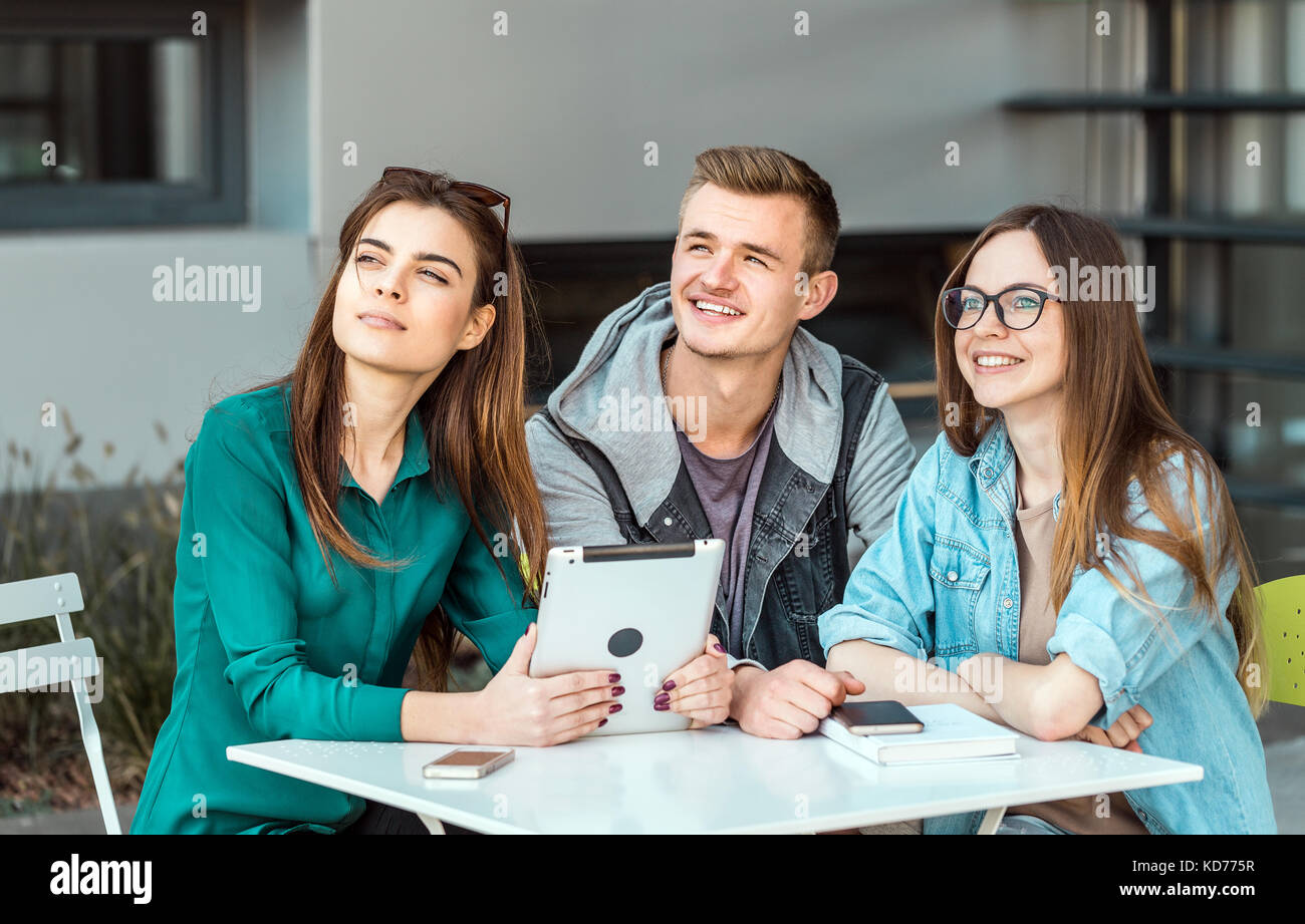 Group of students wear glasses have work conversation outdoor cafe ...