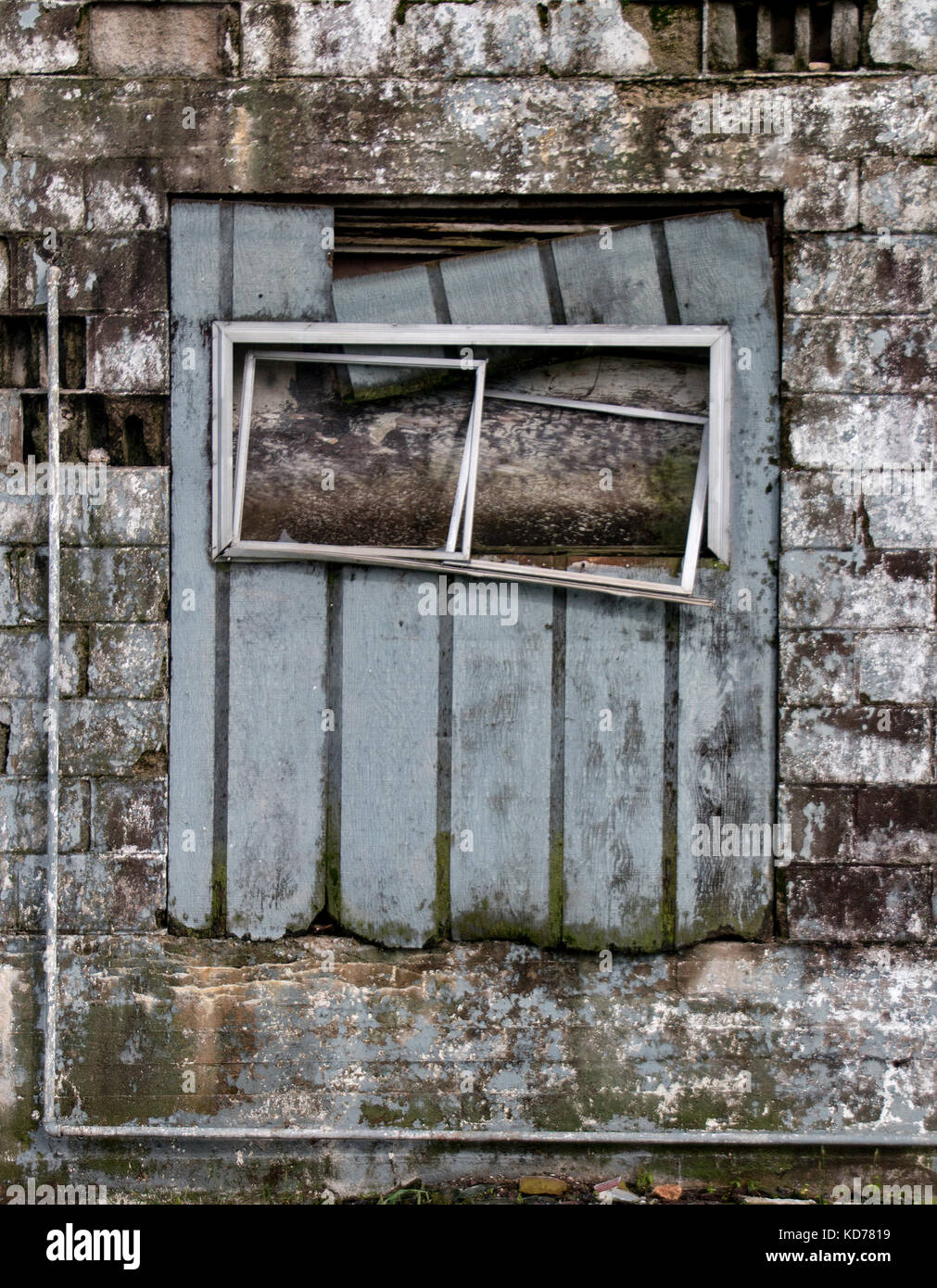 A dilapidated window on a brick building Stock Photo - Alamy
