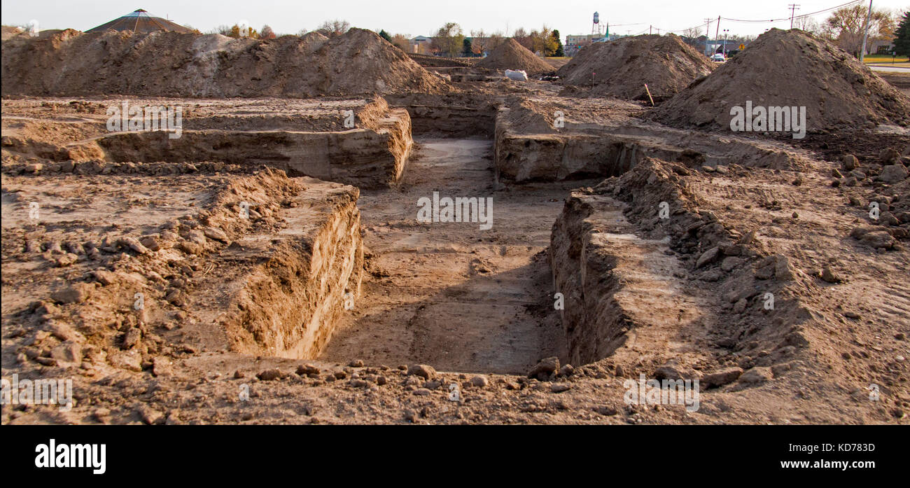 A cross-shaped trench dug into the ground Stock Photo - Alamy