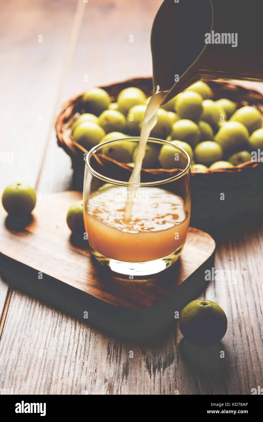 Indian fresh gooseberry juice or stock photo of Amla juice (Phyllanthus ...
