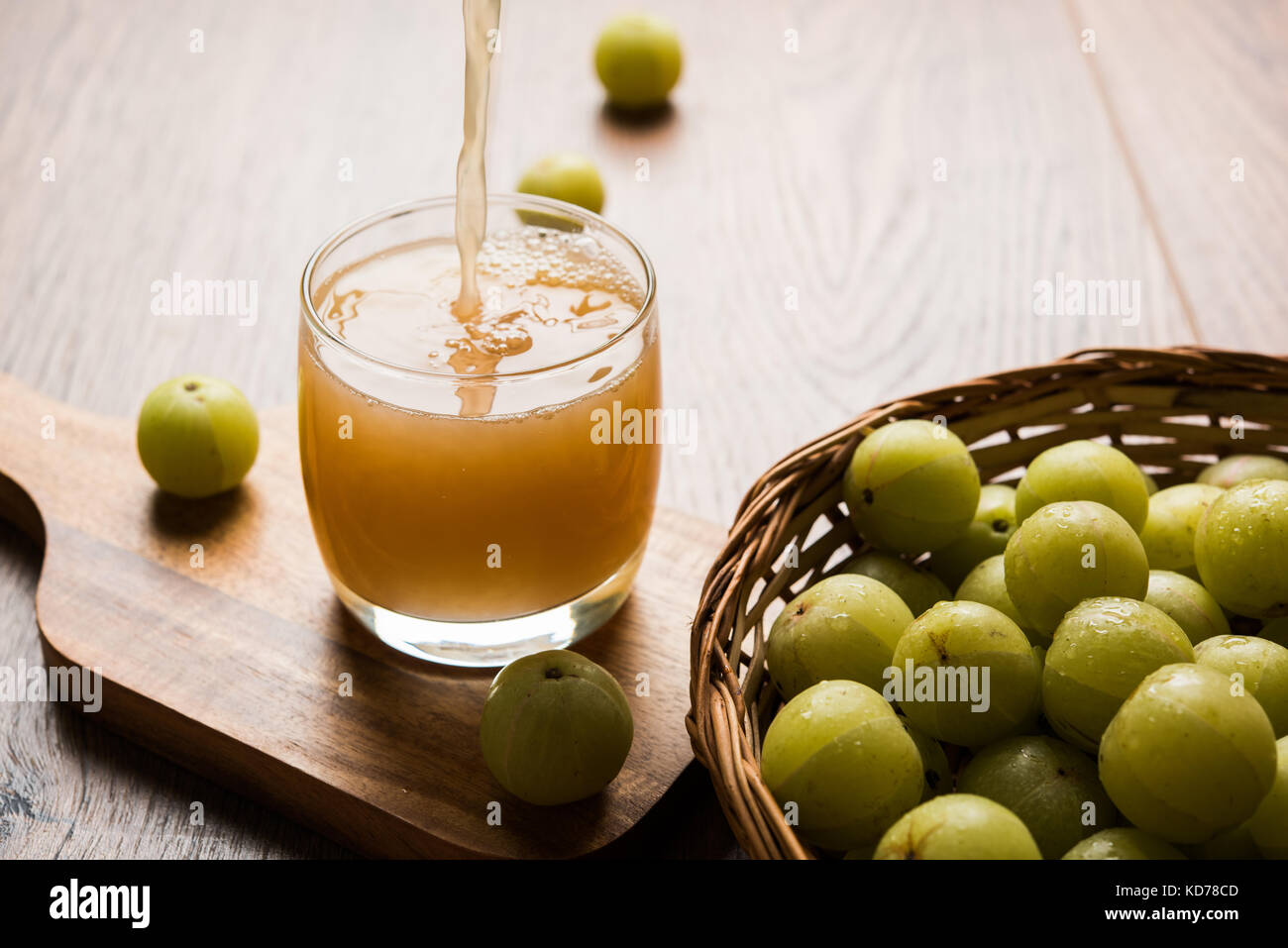 Indian fresh gooseberry juice or stock photo of Amla juice (Phyllanthus ...