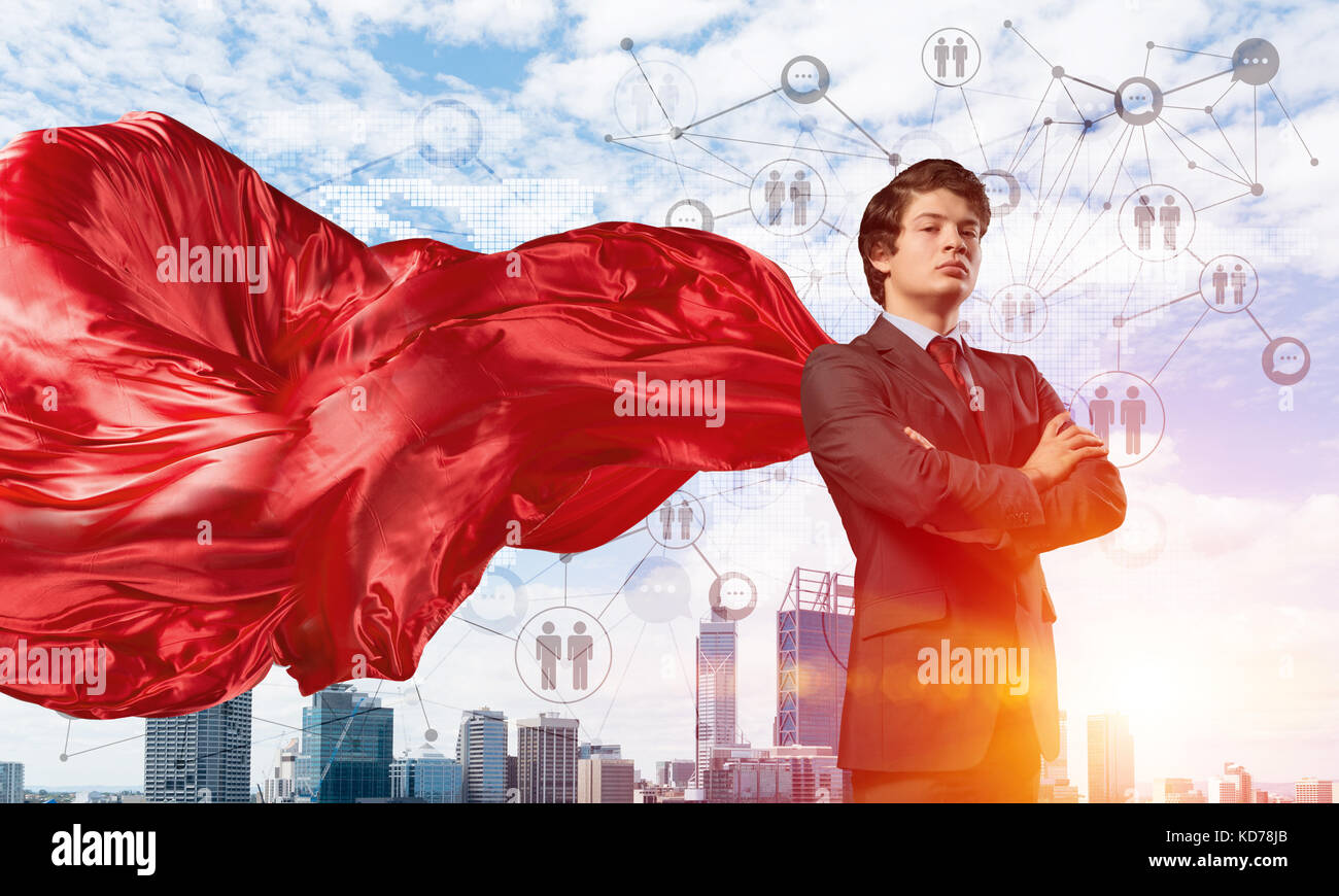 Concept of power and sucess with businessman superhero in big city ...