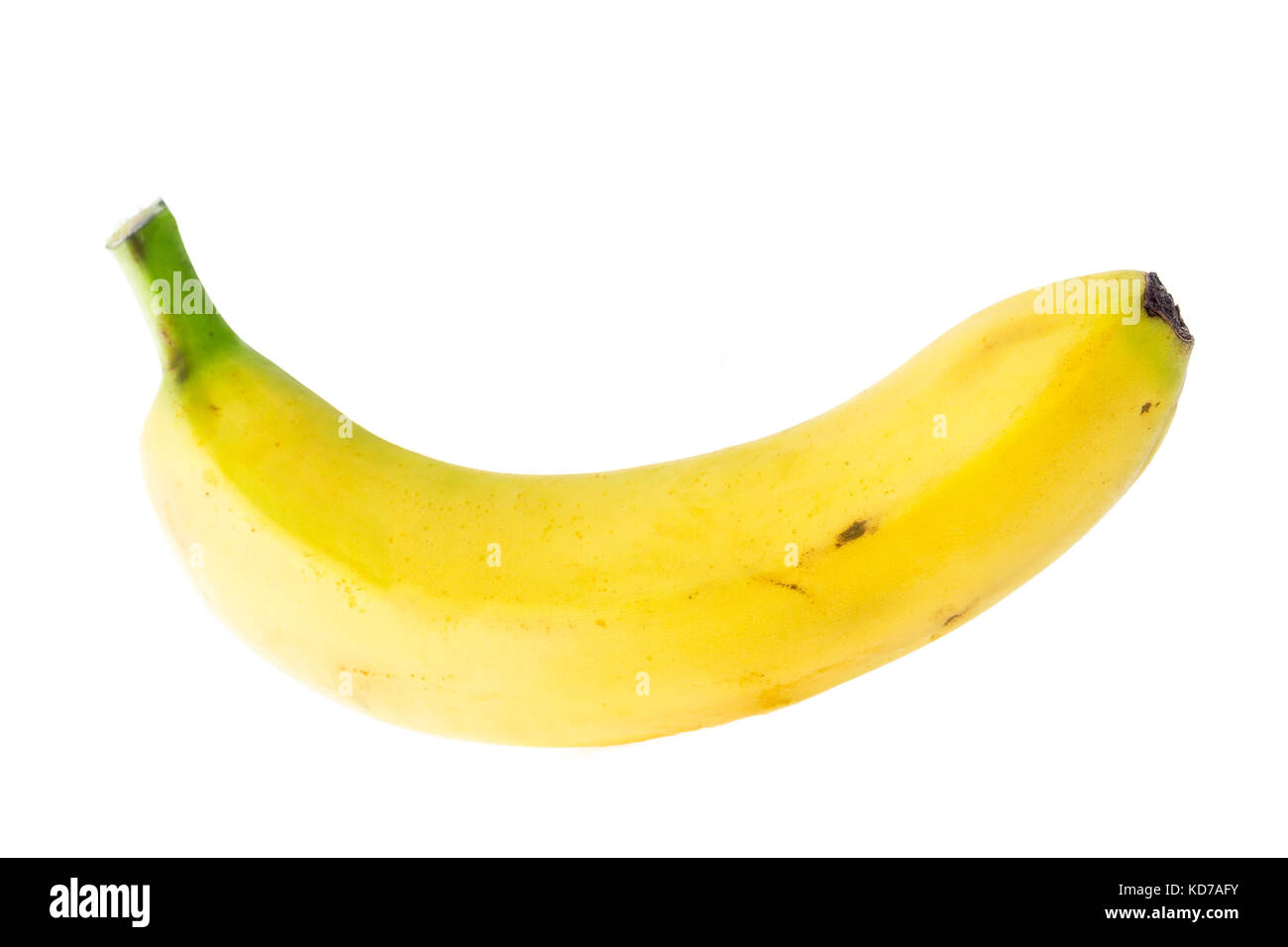 Single banana against white background Stock Photo - Alamy