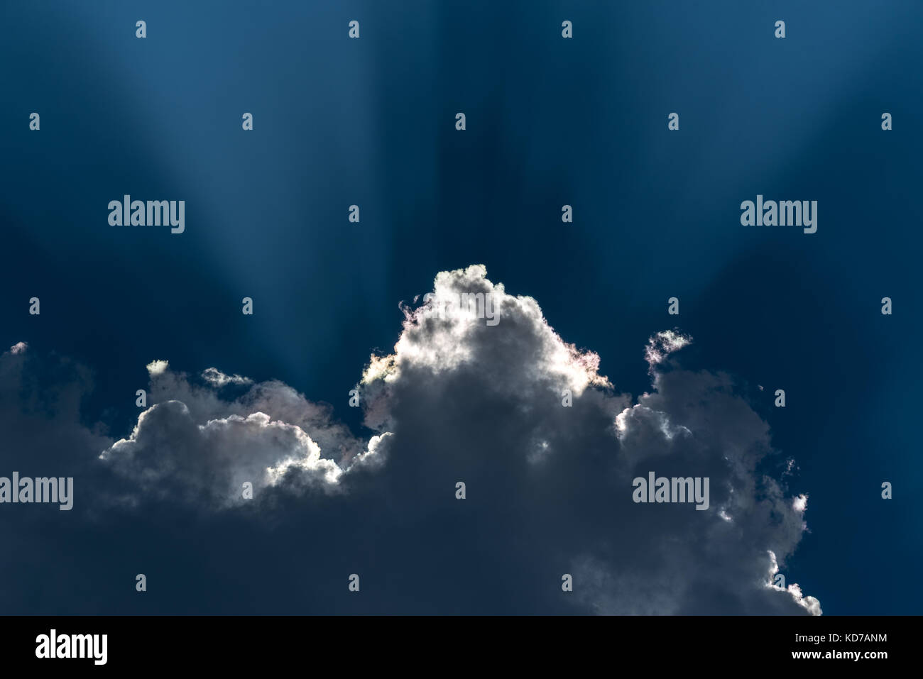 Sun rays and cloud Stock Photo - Alamy