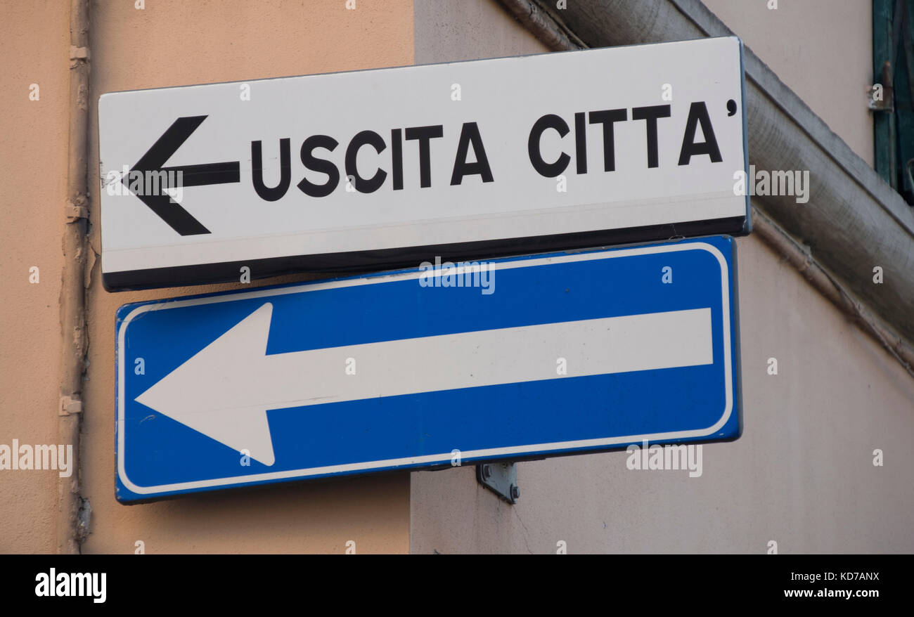 One way sign and city exit sign in Italy Stock Photo - Alamy