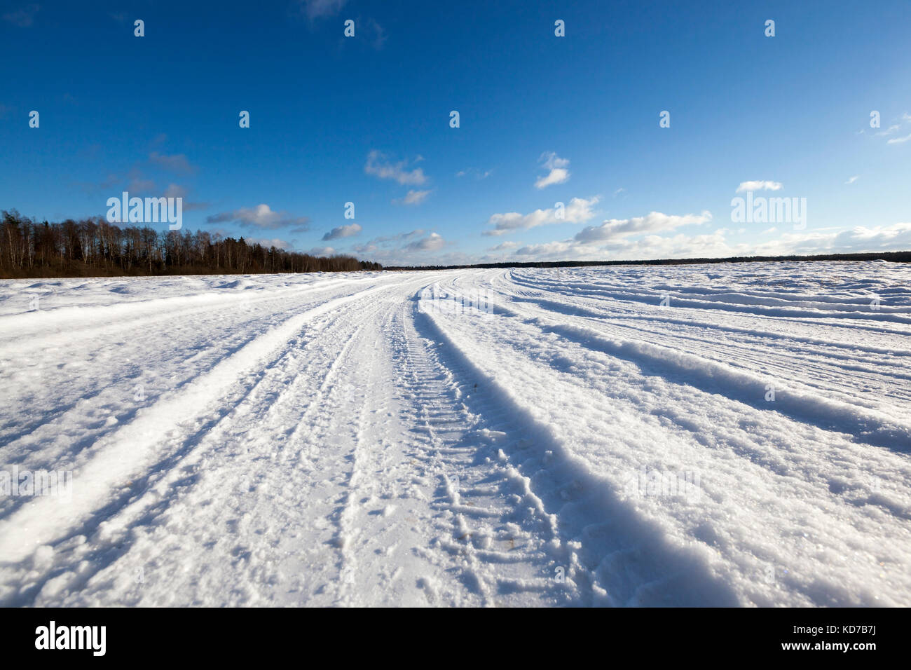 Snow on the road, winter Stock Photo - Alamy