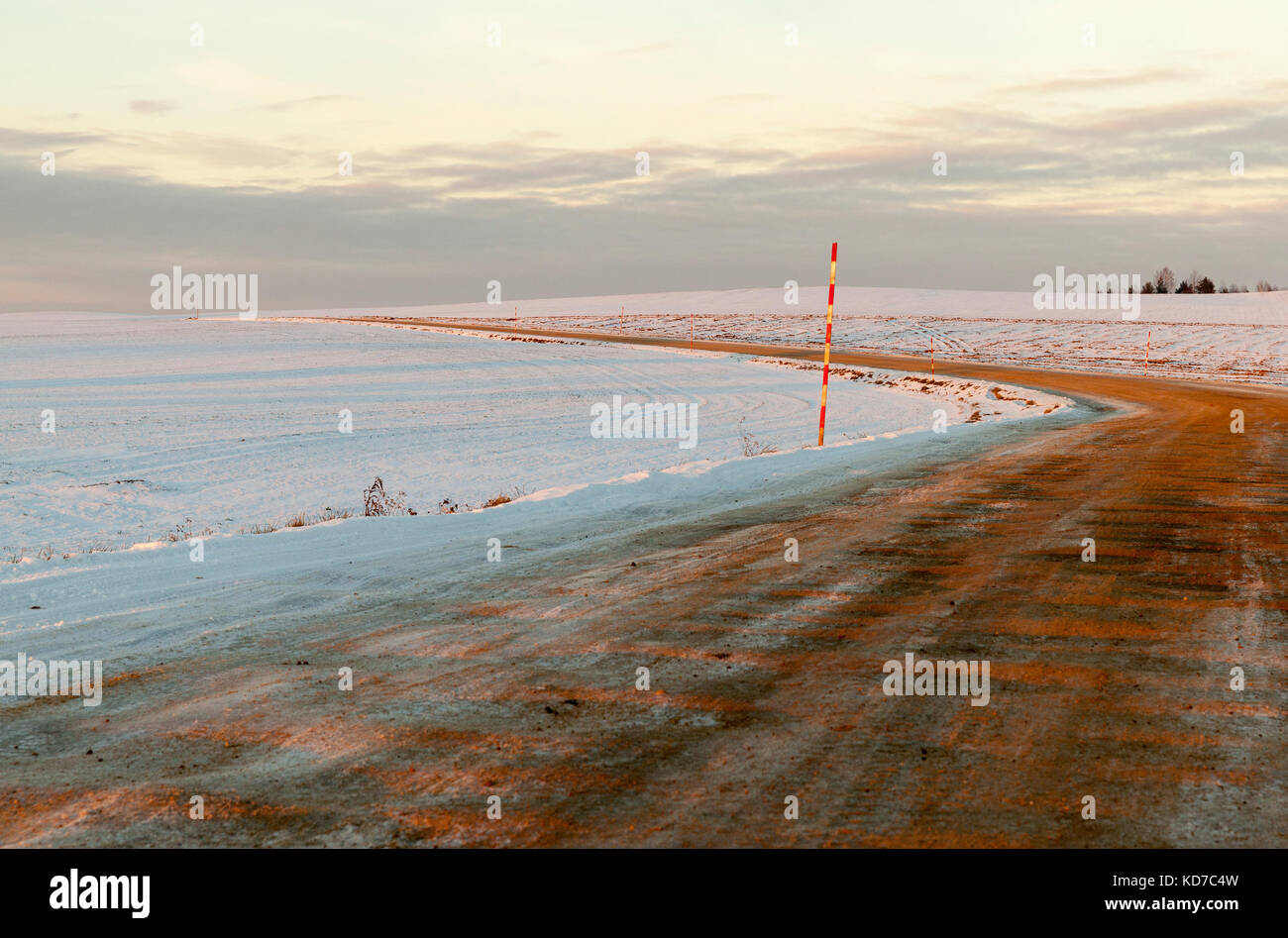 Ruts on a snow-covered road Stock Photo - Alamy