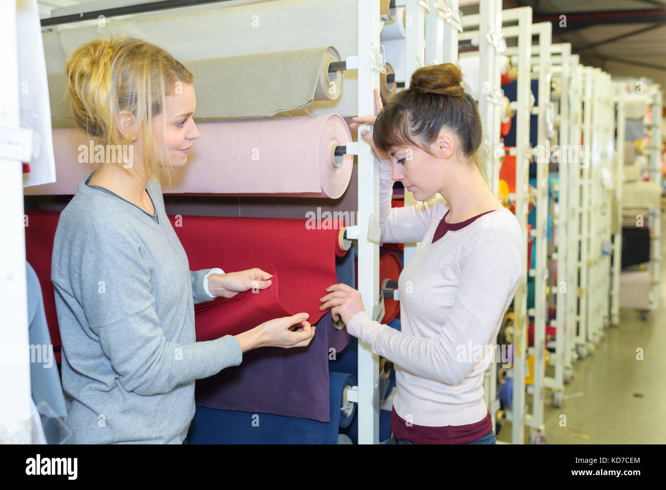 touching the fabrics Stock Photo - Alamy