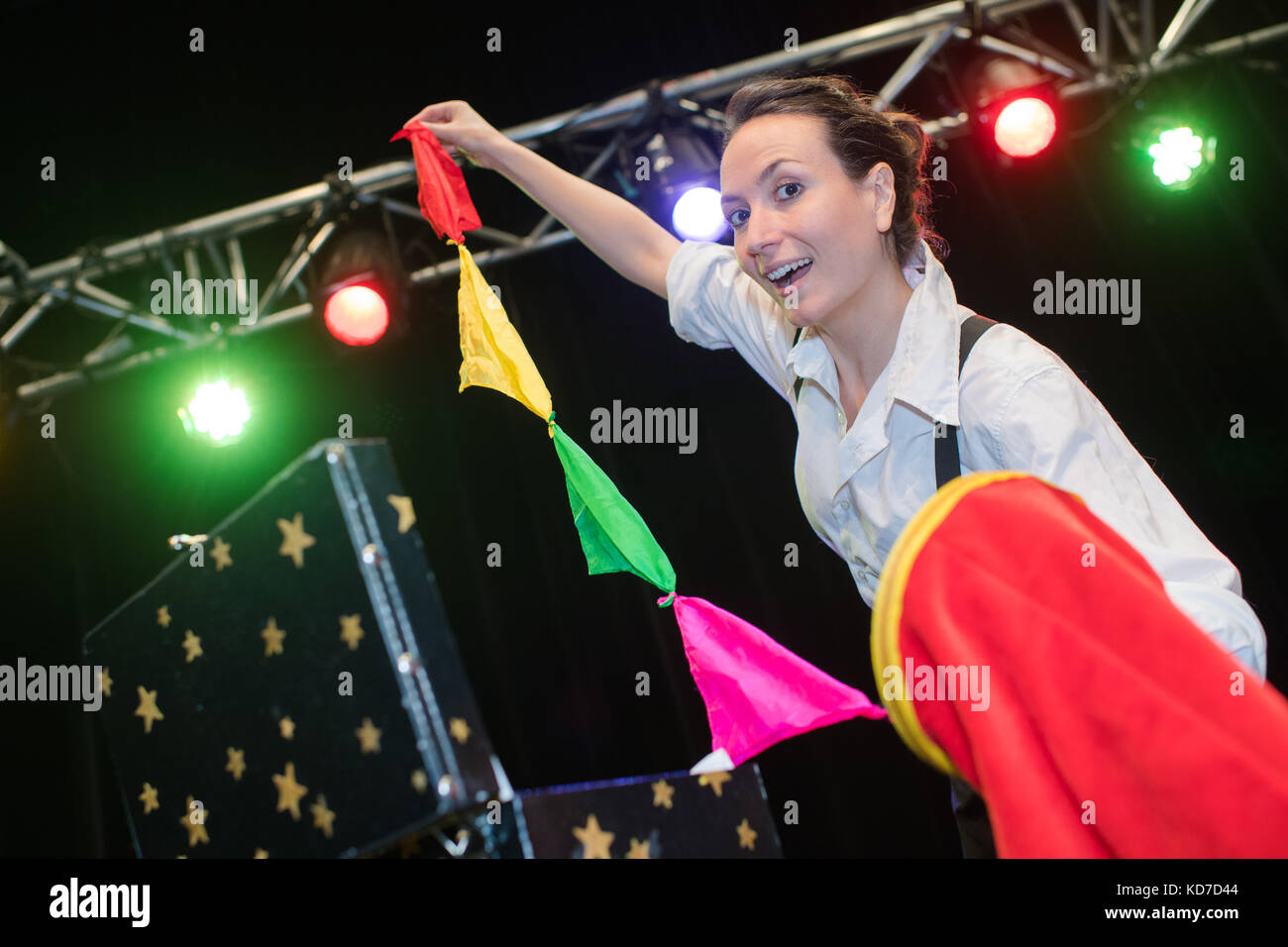 beautiful female magician on stage Stock Photo - Alamy
