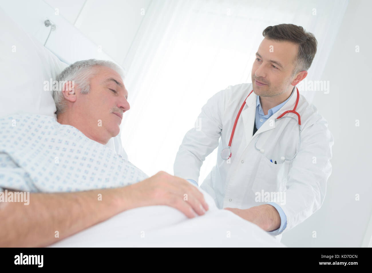 doctor inspecting the patient Stock Photo - Alamy
