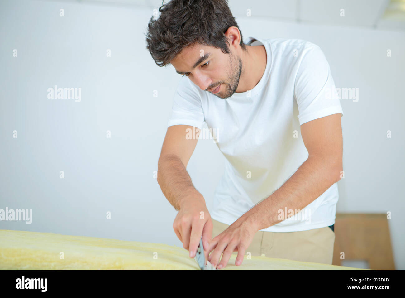 cutting the material Stock Photo - Alamy