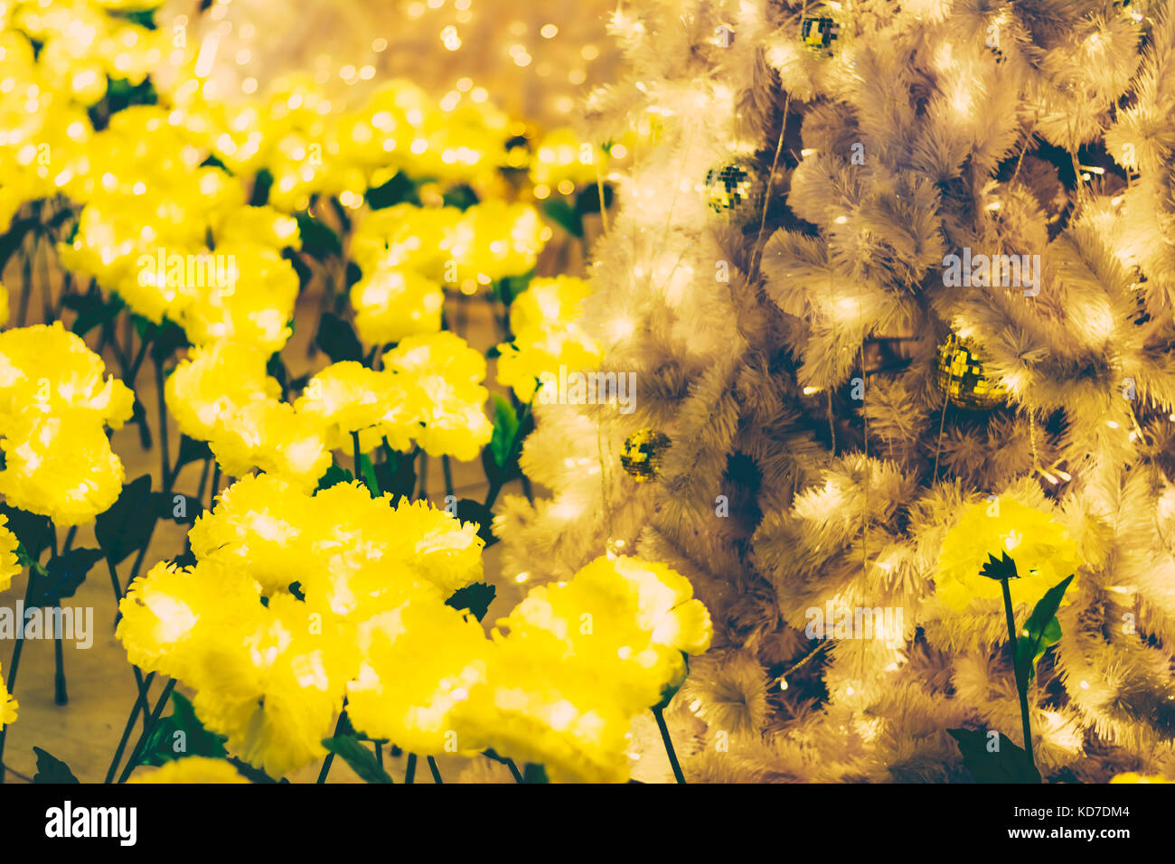 Yellow christmas ornaments on tree Stock Photo - Alamy