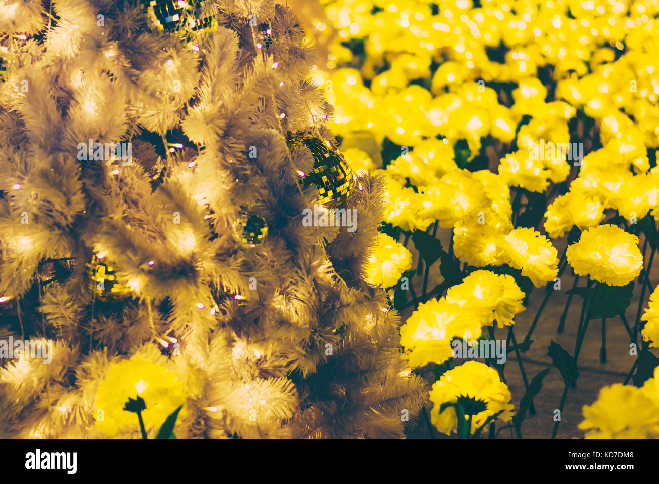 Yellow christmas ornaments on tree Stock Photo - Alamy