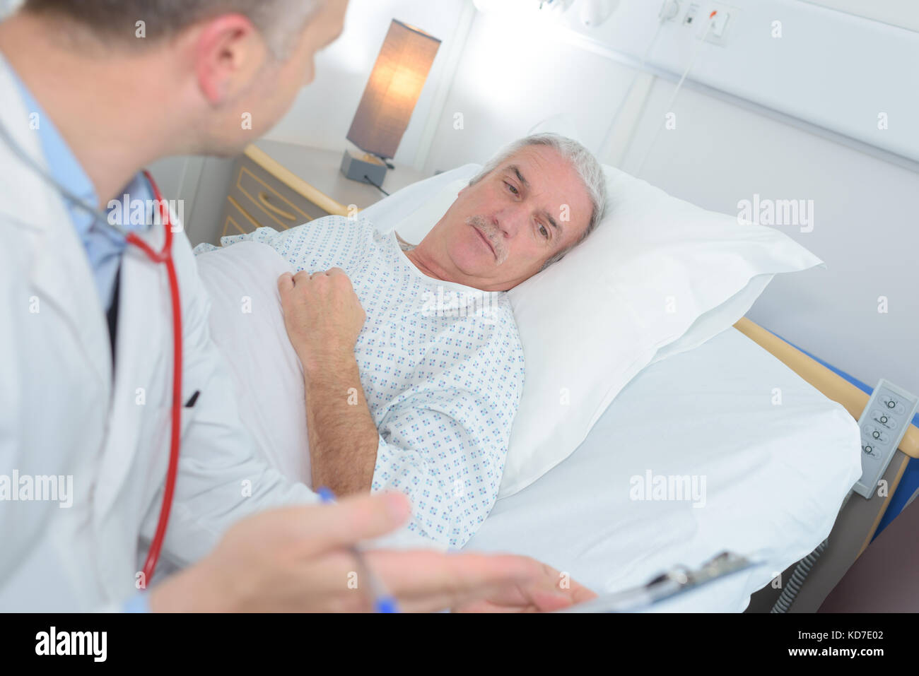 doctor telling the patient the news Stock Photo - Alamy