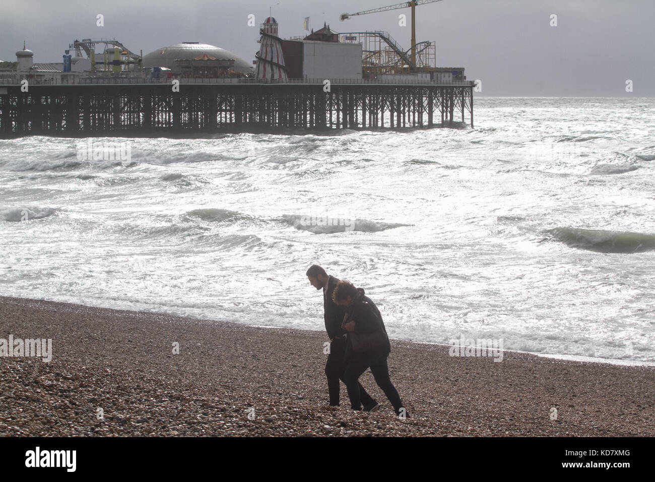 Brighton, Sussex. 11th Oct, 2017. UK Weather. People brave the blustery ...