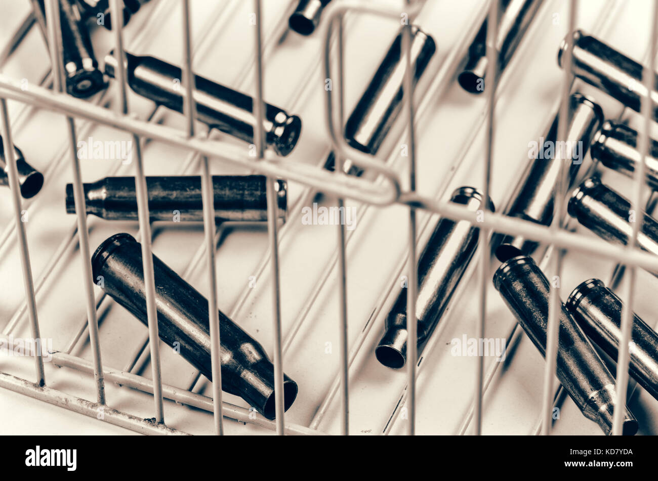 Bullets inside a cage, a concept on gun violence Stock Photo - Alamy