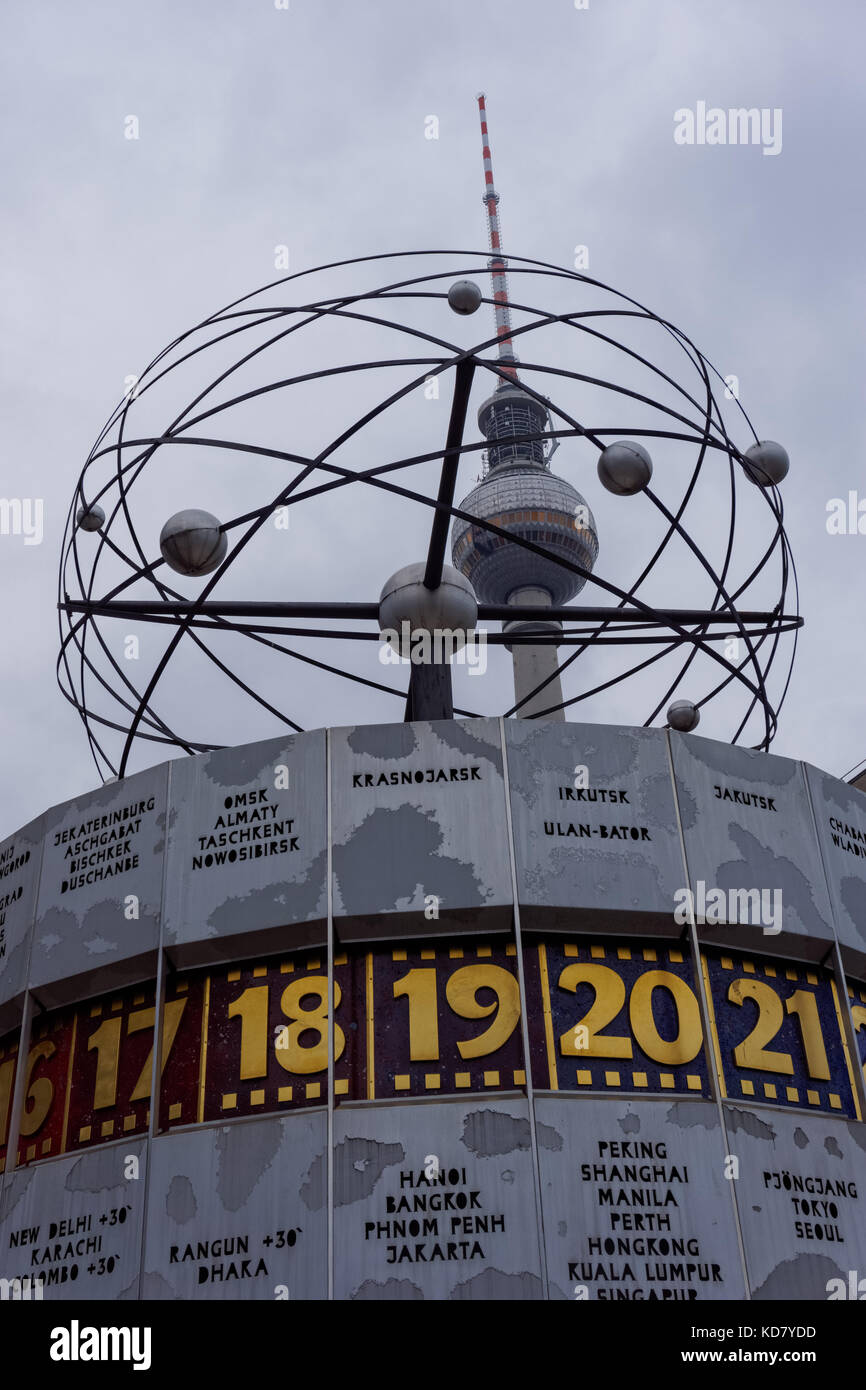 The World Clock and the TV Tower on Alexanderplatz in Berlin, Germany ...