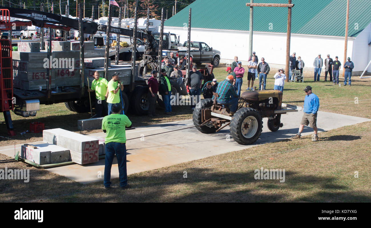 An antique tractor pulling weight at the Fryeburg Fair, Fryeburg, Maine ...
