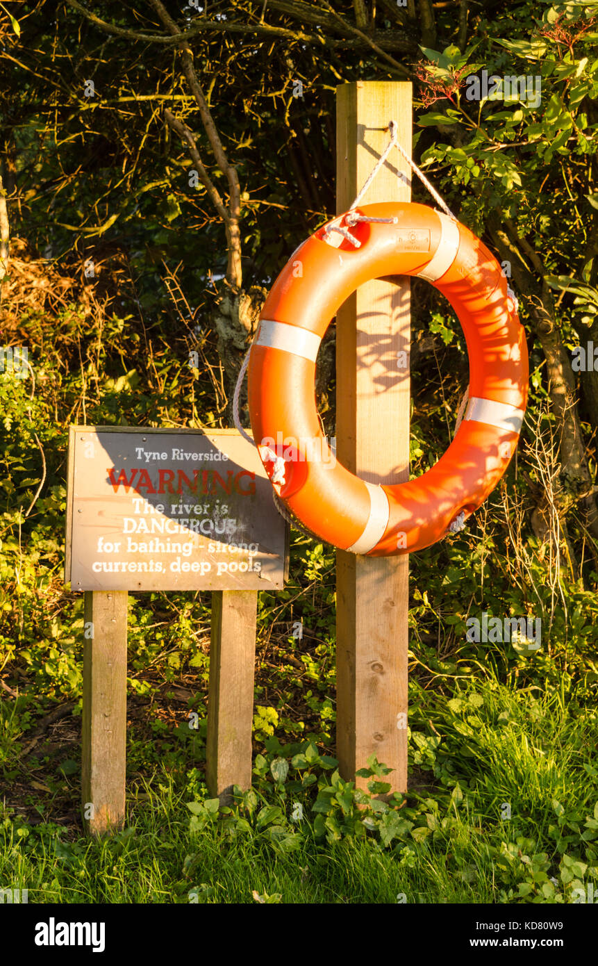 River Warning Sign and LifeBuoy Ring Stock Photo - Alamy