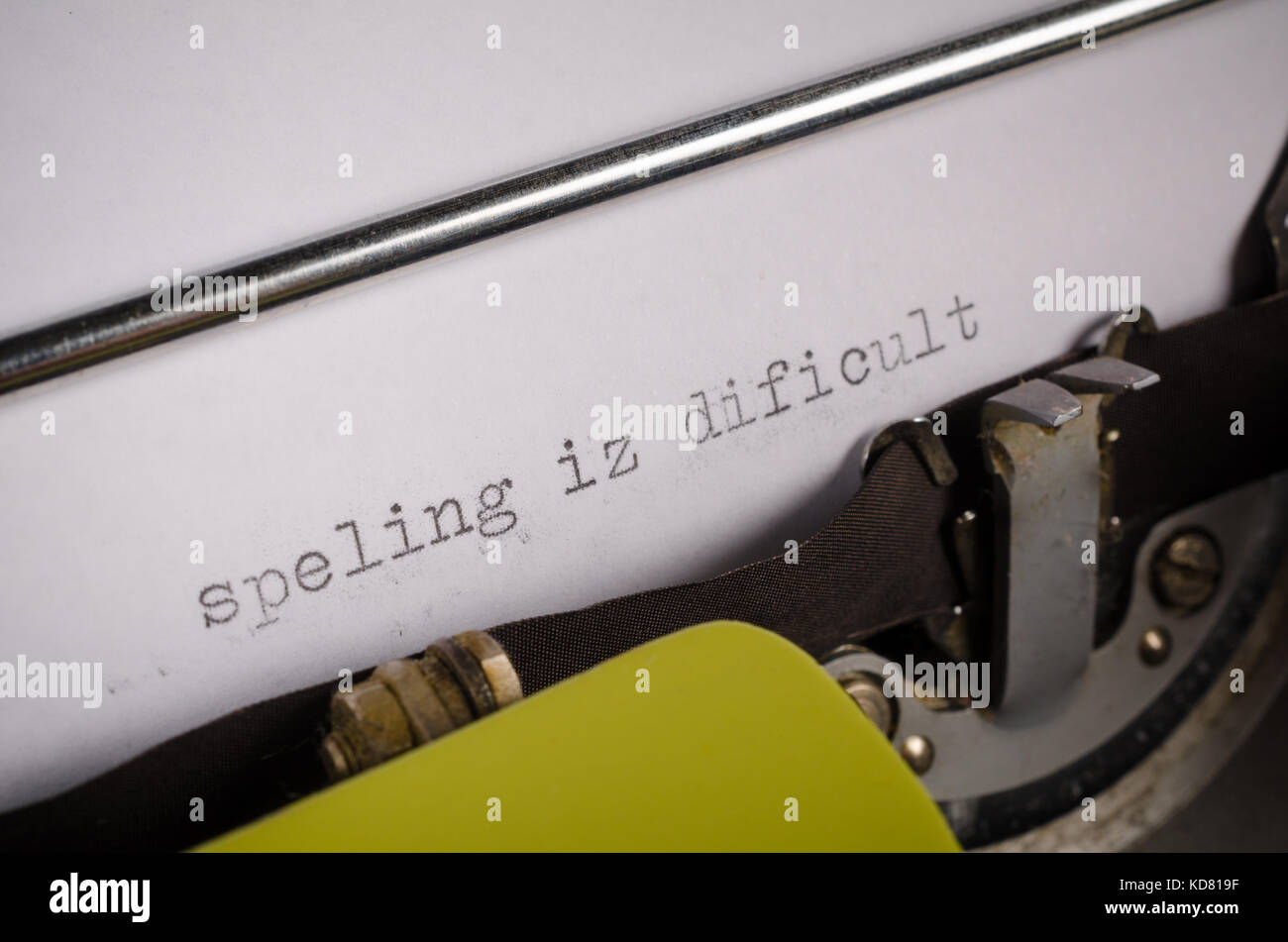 Old typewriter with text that contains spelling mistakes, a concept ...