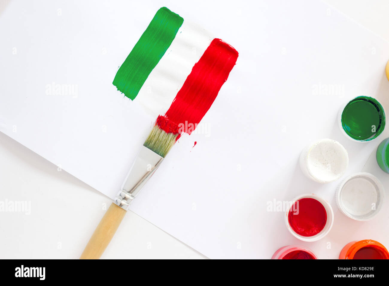 The Italian flag painted on white paper Stock Photo - Alamy