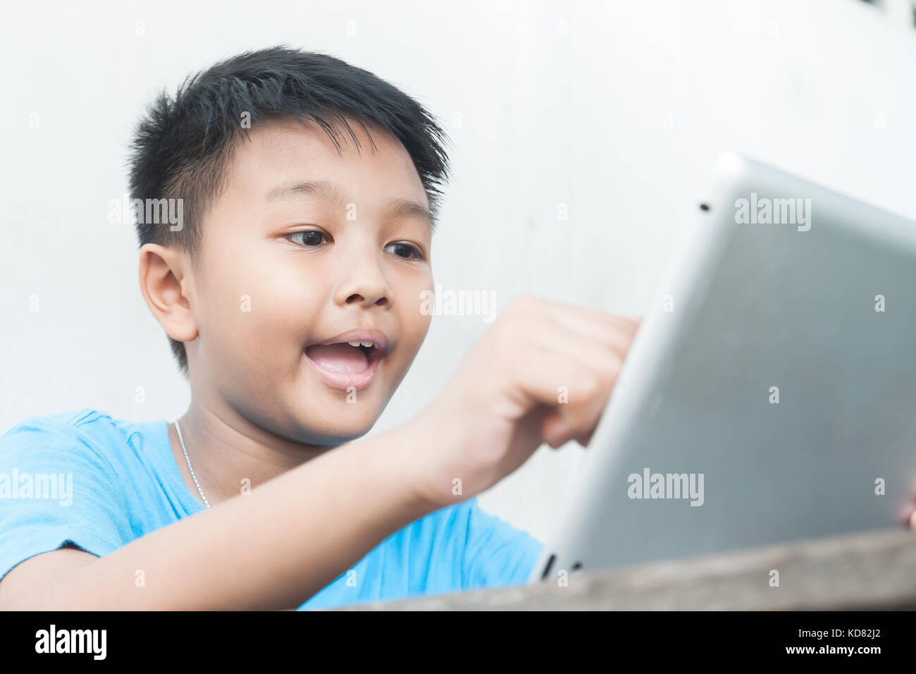 Happy asian boy hi-res stock photography and images - Alamy