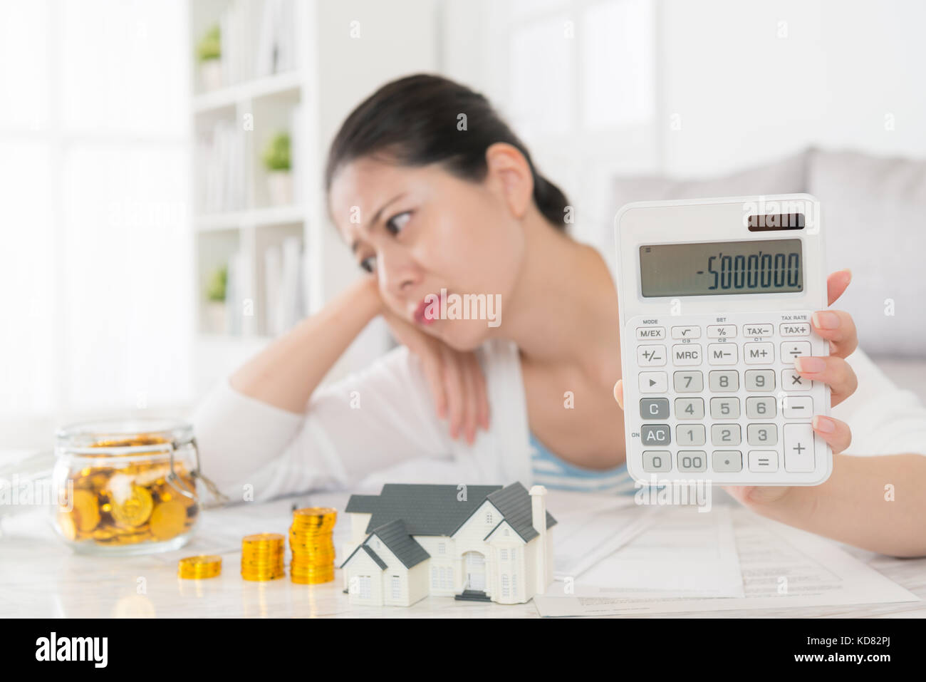 Confused by calculator hi-res stock photography and images - Alamy