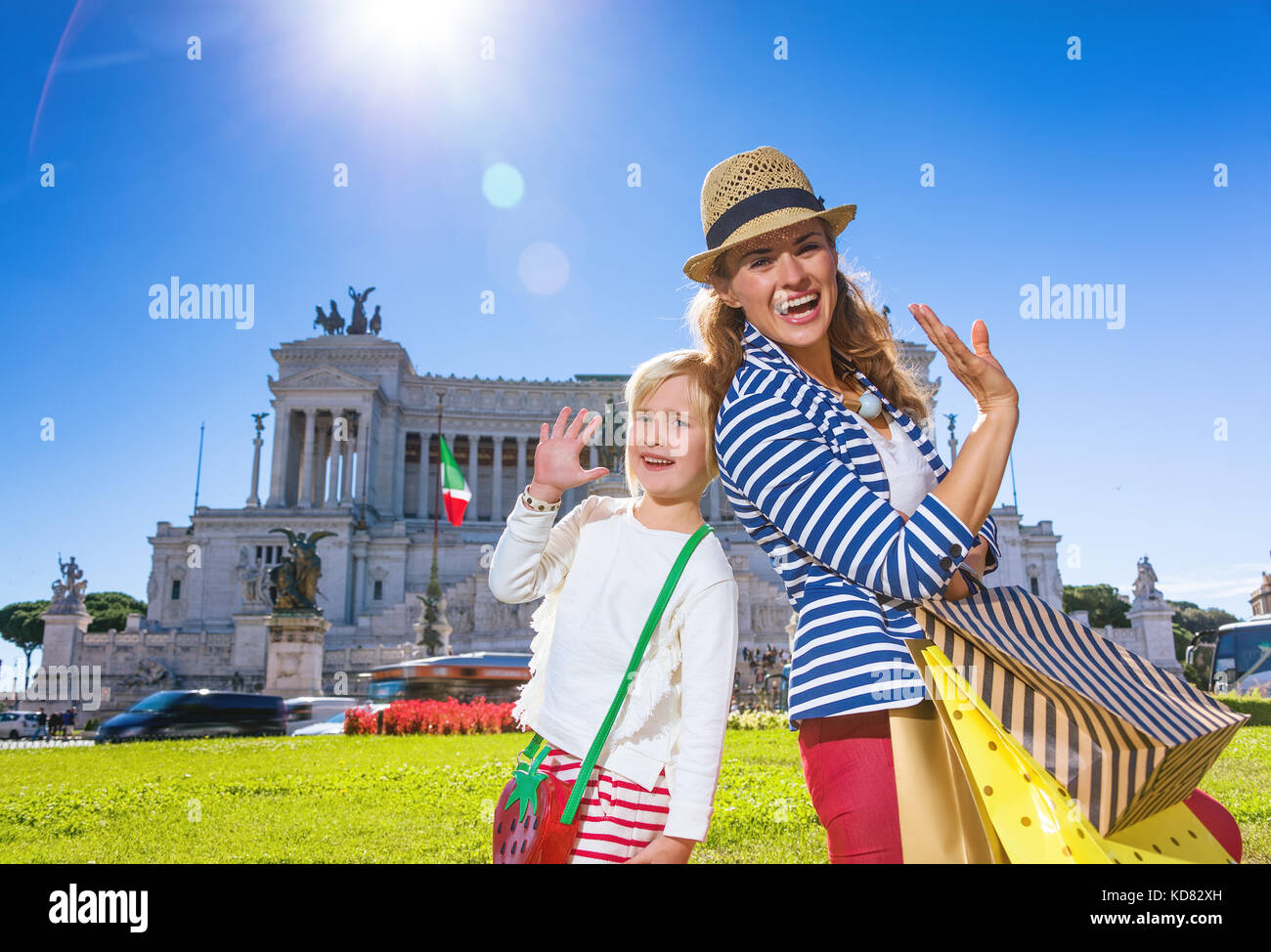 Roman Holiday. happy modern mother and daughter travellers in Rome ...