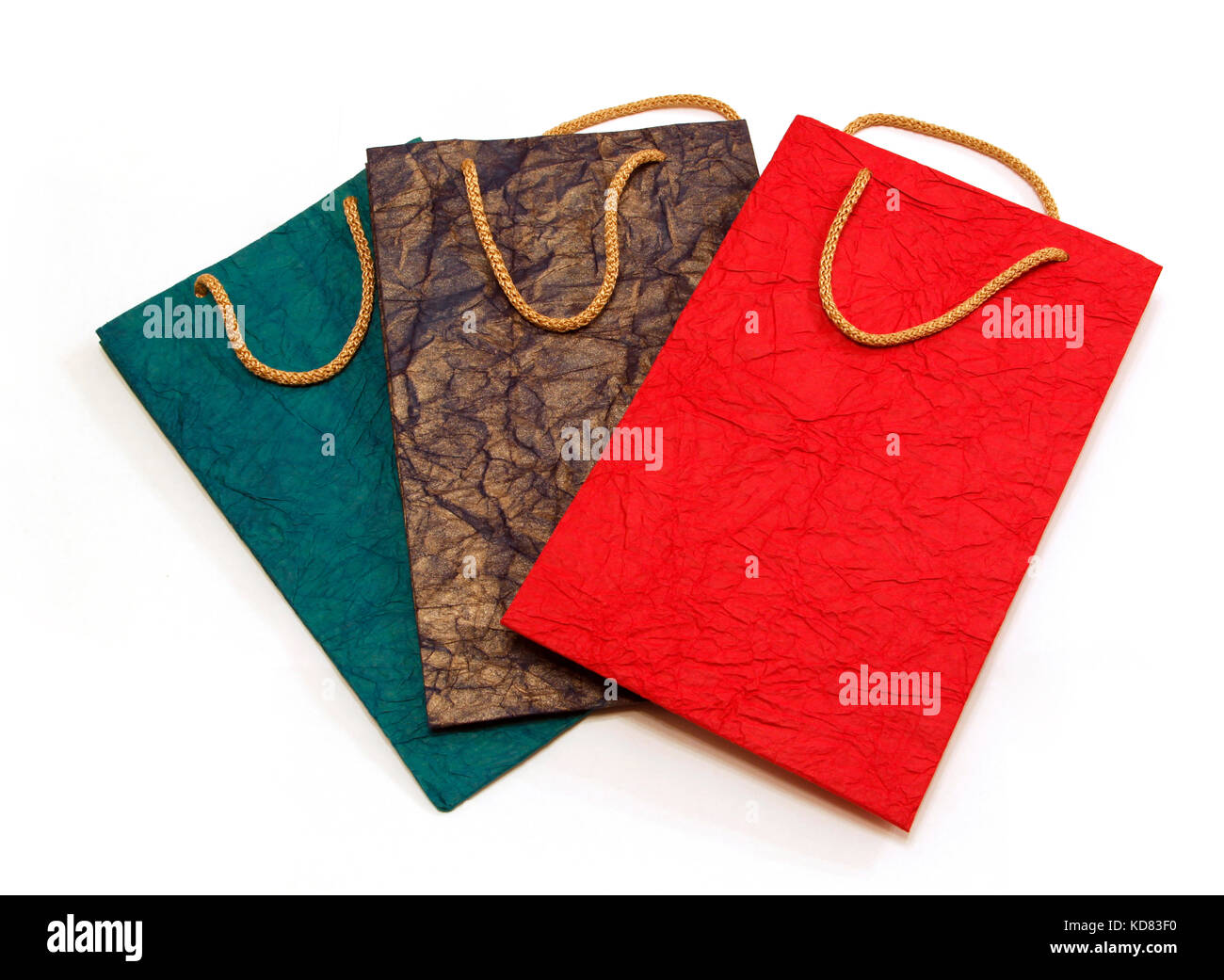 three gift bag on white Stock Photo - Alamy