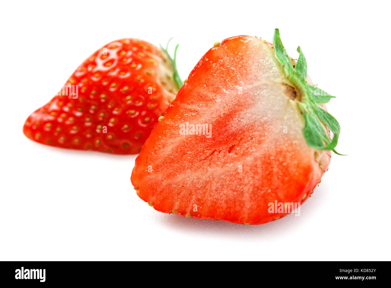 strawberries cut isolated on white background Stock Photo - Alamy
