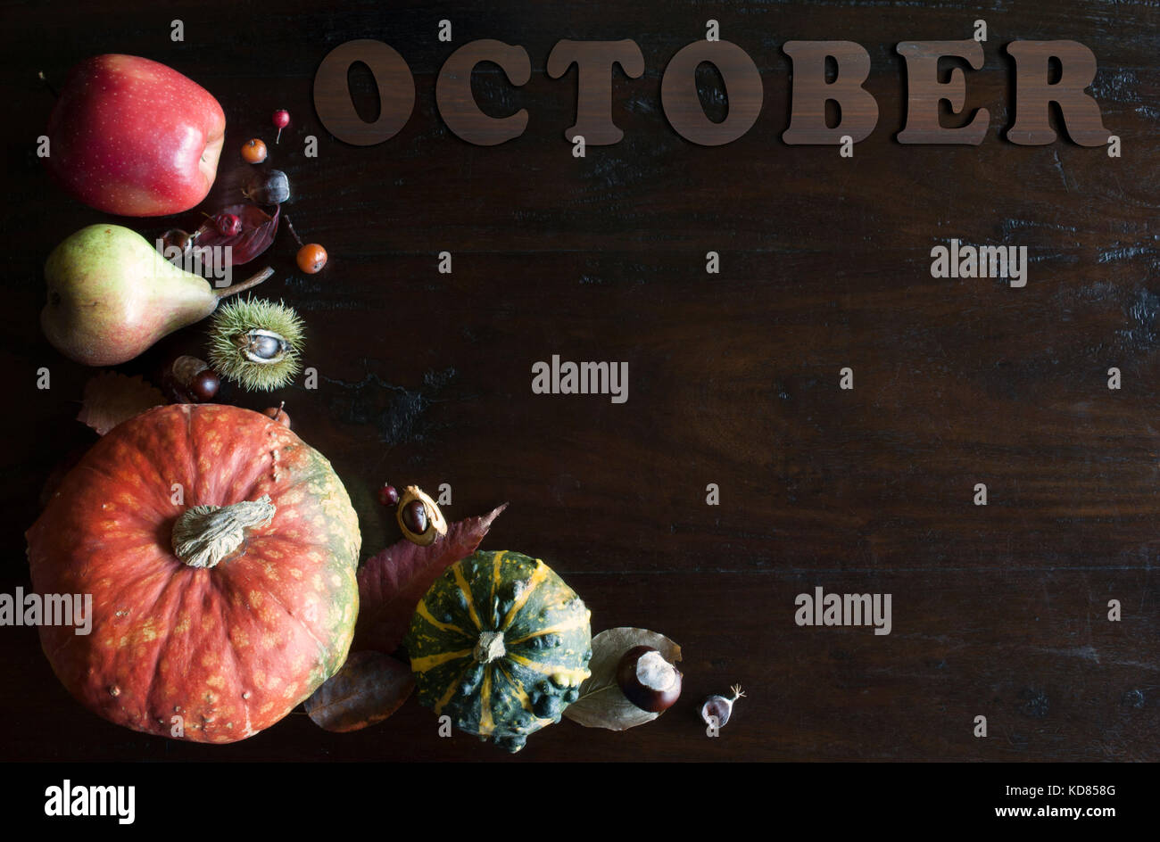 beautiful rustic fall flat lay with leaves, pumpkins, chestnuts and ...