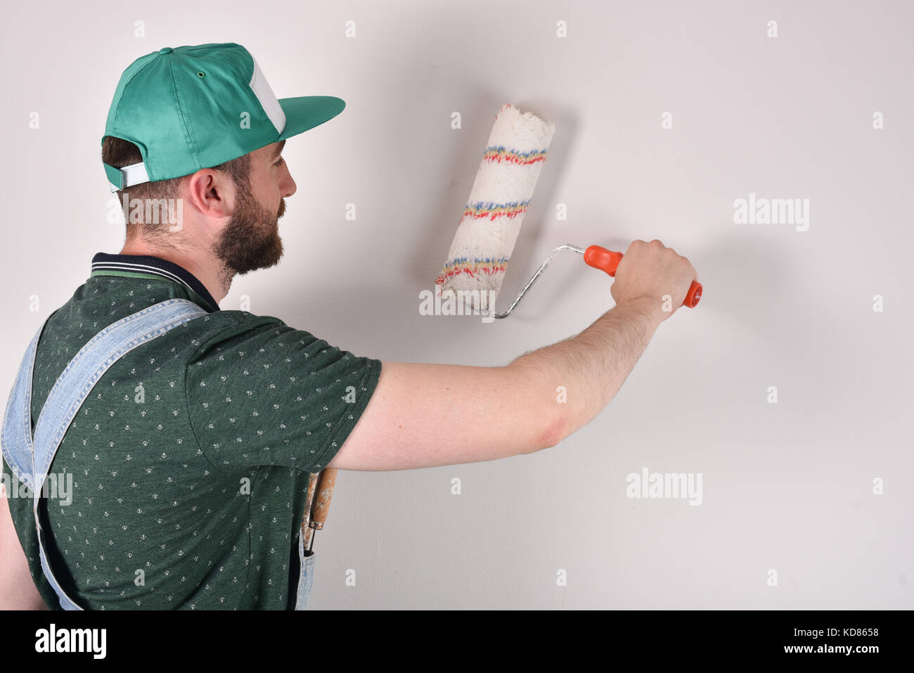 Painting a wall hi-res stock photography and images - Alamy