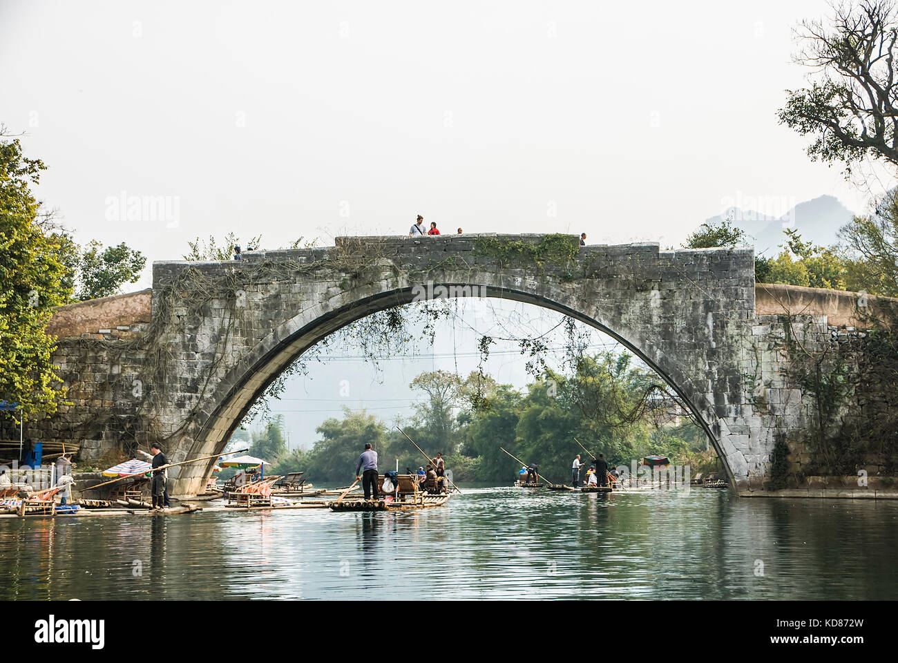 Guilin, China - Jan 29, 2013: Tourists taking bamboo raft rides during ...