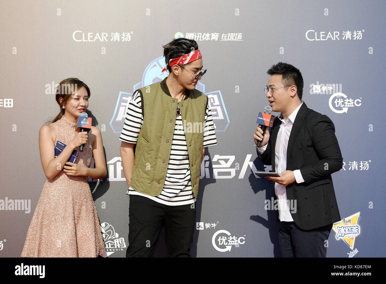 Chinese singer and actor Kris Wu or Wu Yifan, center, poses at the ...