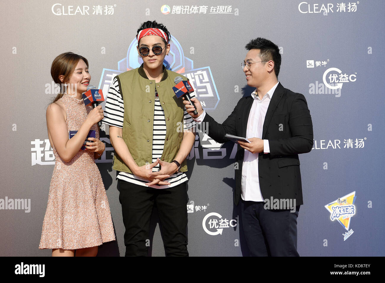 Chinese singer and actor Kris Wu or Wu Yifan, center, poses at the ...