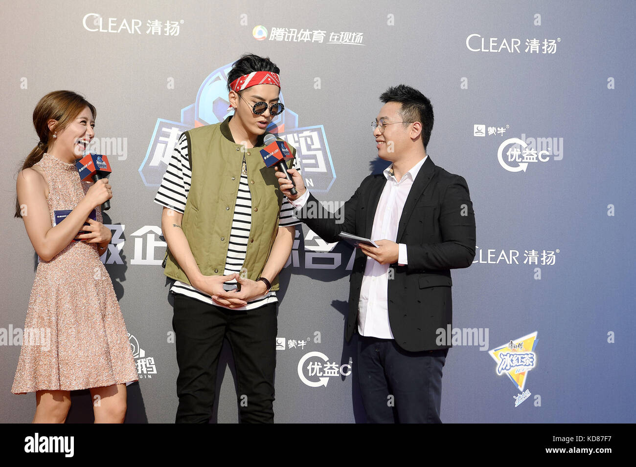 Chinese singer and actor Kris Wu or Wu Yifan, center, poses at the ...