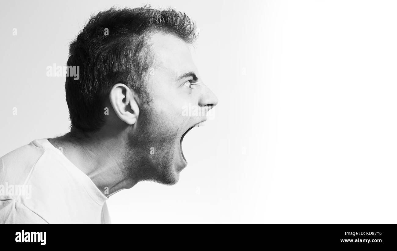 Person screaming profile Black and White Stock Photos & Images - Alamy