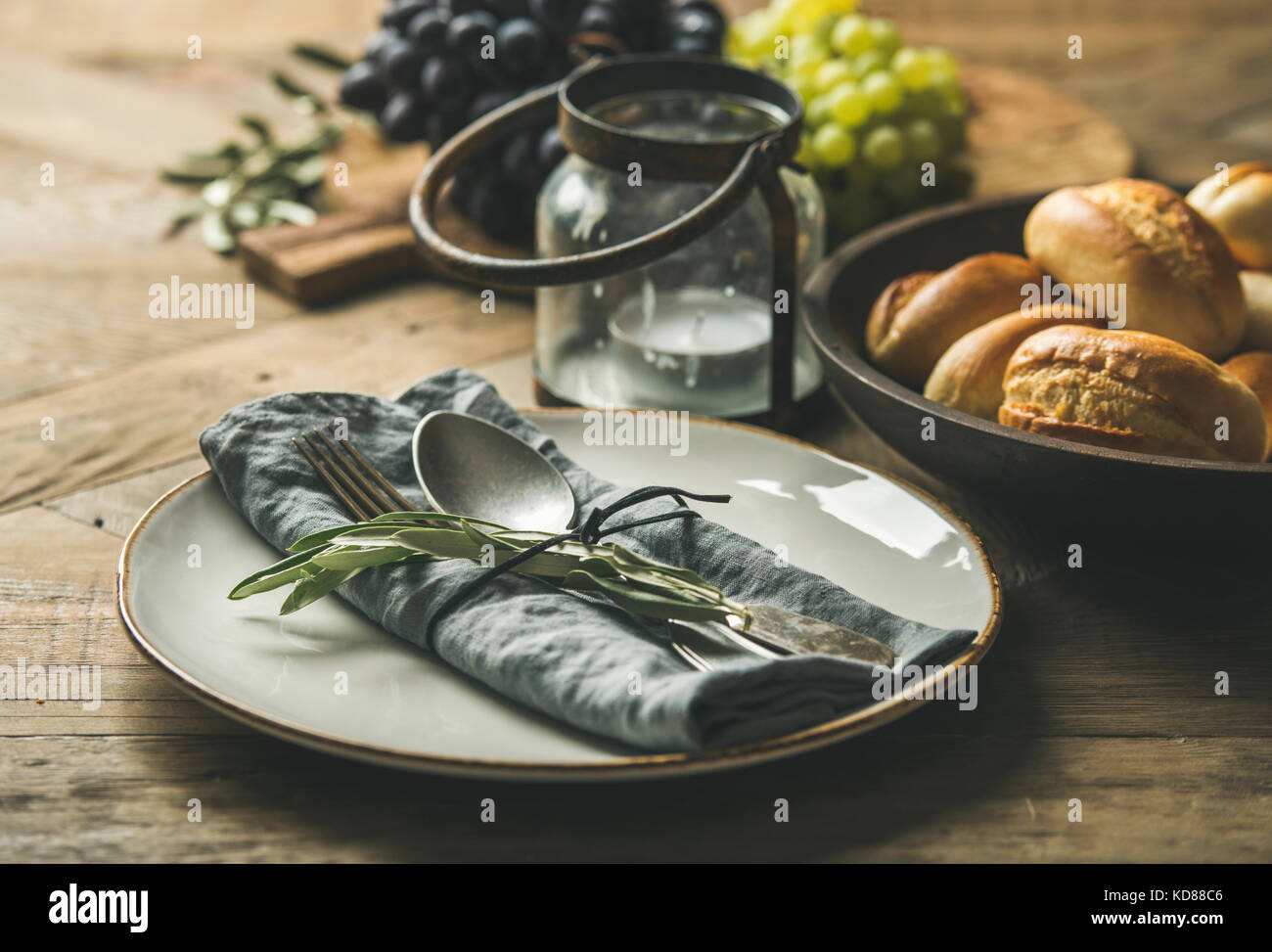 Fall holiday table party decoration setting. Plate with linen napkin ...