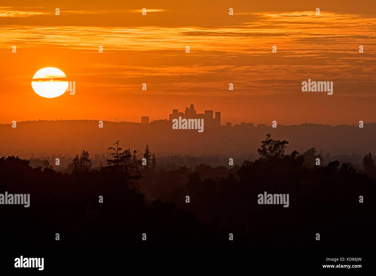 Sunset over Los Angeles city skyline Stock Photo - Alamy