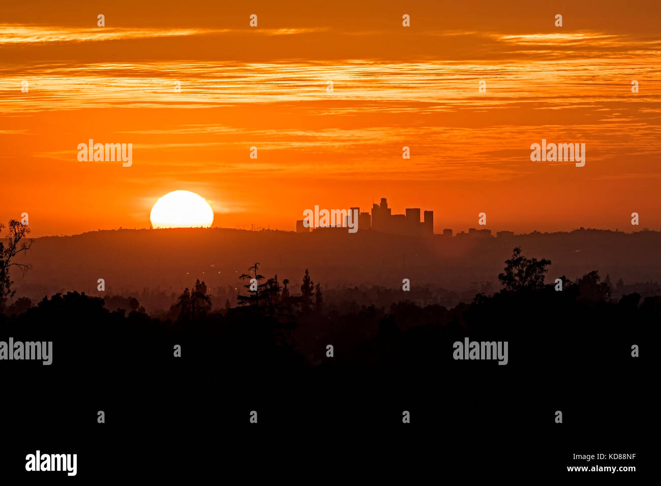 Sunset over Los Angeles city skyline Stock Photo - Alamy