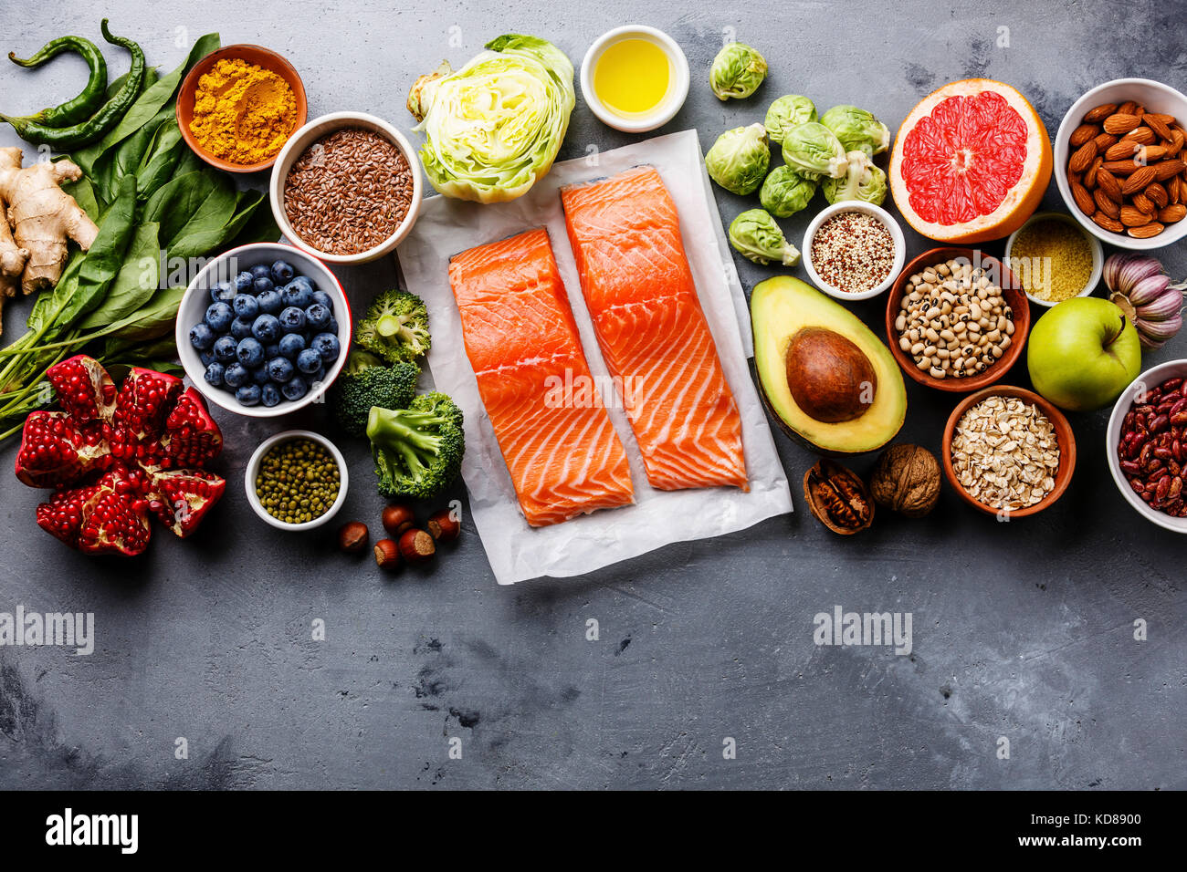 Healthy food clean eating selection: fish, fruit, vegetable, seeds ...