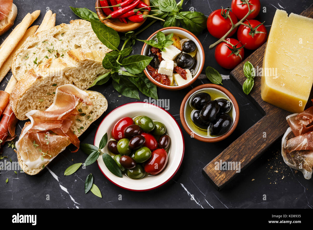 Italian snacks food with Ham, Sliced bread Ciabatta, Olives, Feta ...