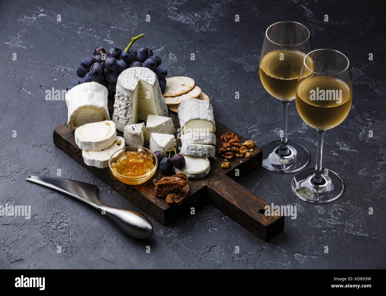 Goat Cheese board Snack assortment with confiture and grape on cutting ...