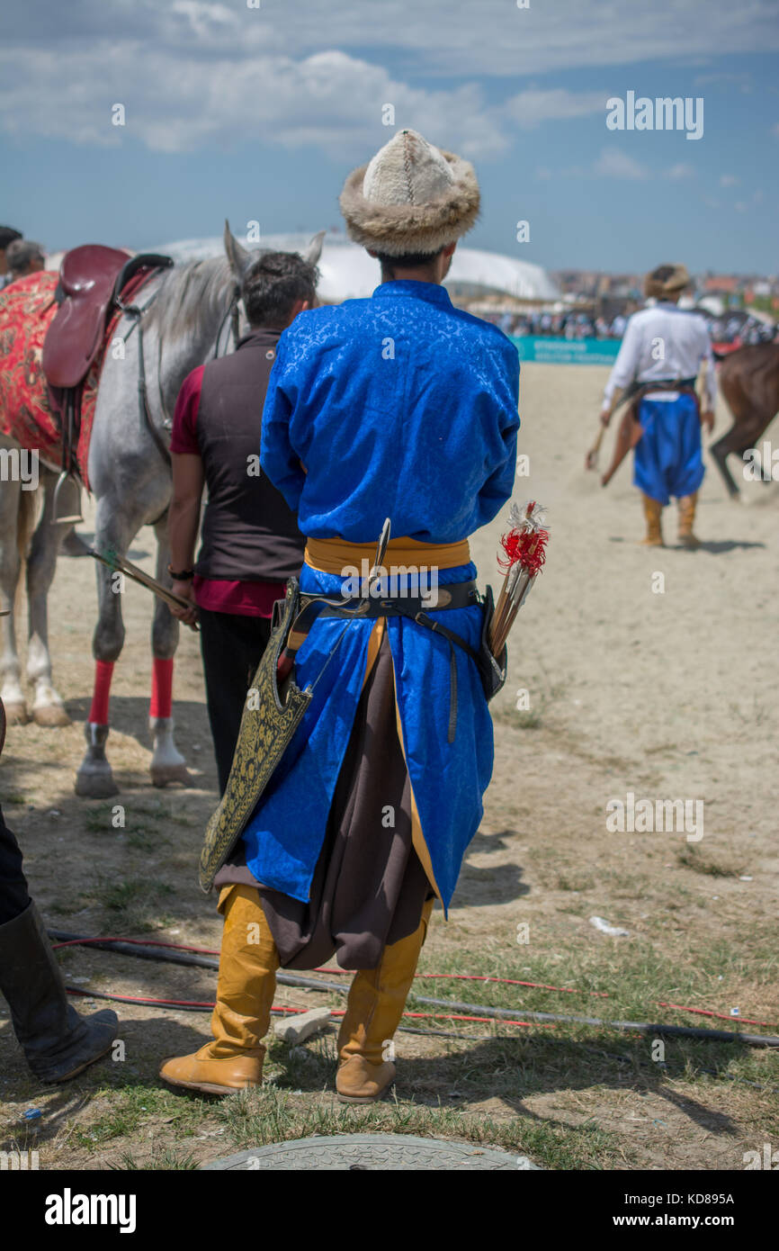 Turkish man and horseman ethnic clothes examples Stock Photo - Alamy
